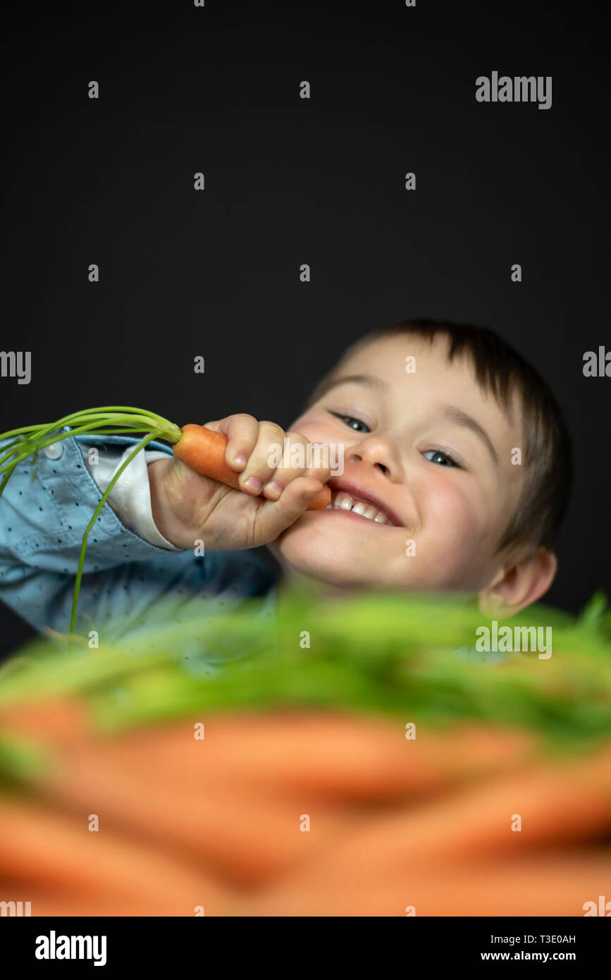 Boy Carrot Eat High Resolution Stock Photography and Images - Alamy