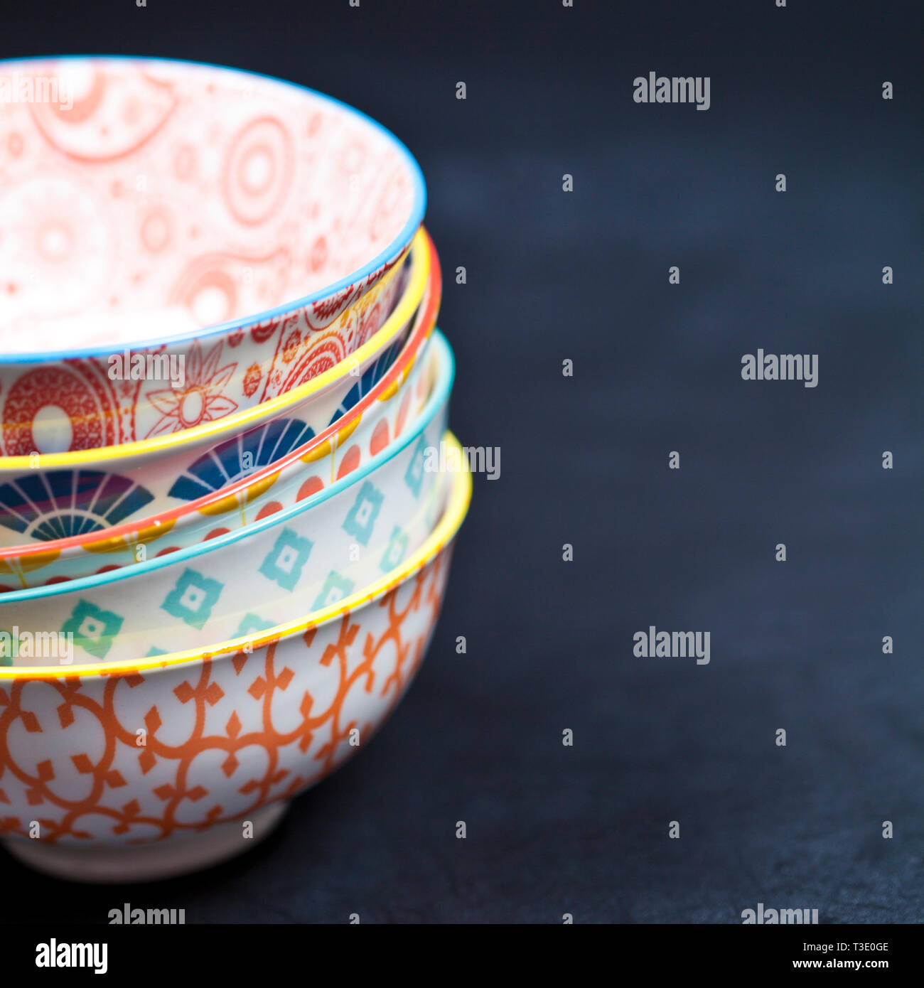 Stack of plates bowls and utensils hi-res stock photography and images ...
