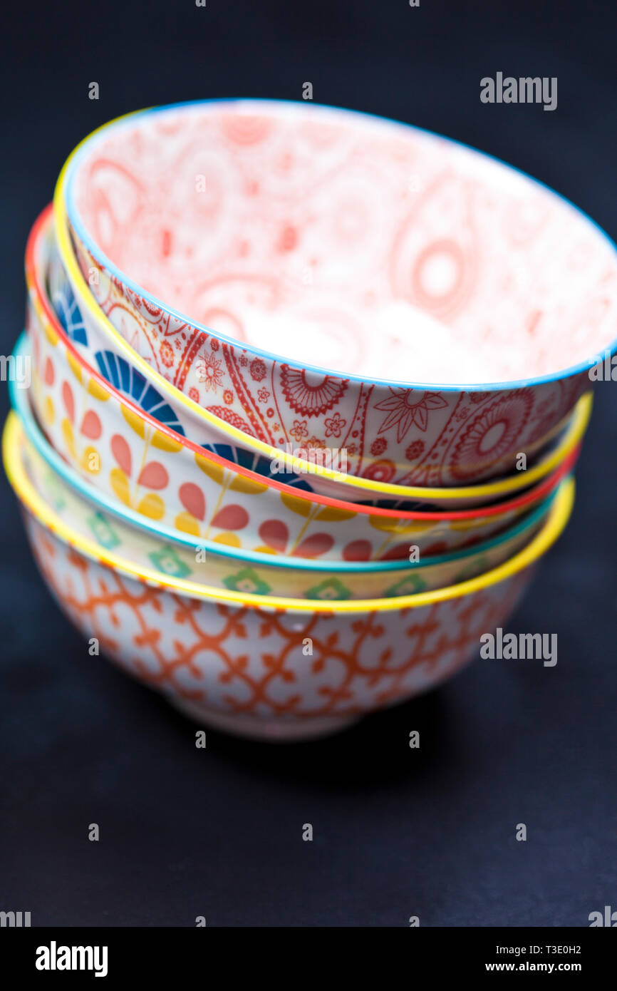Stack of plates bowls and utensils hi-res stock photography and images ...