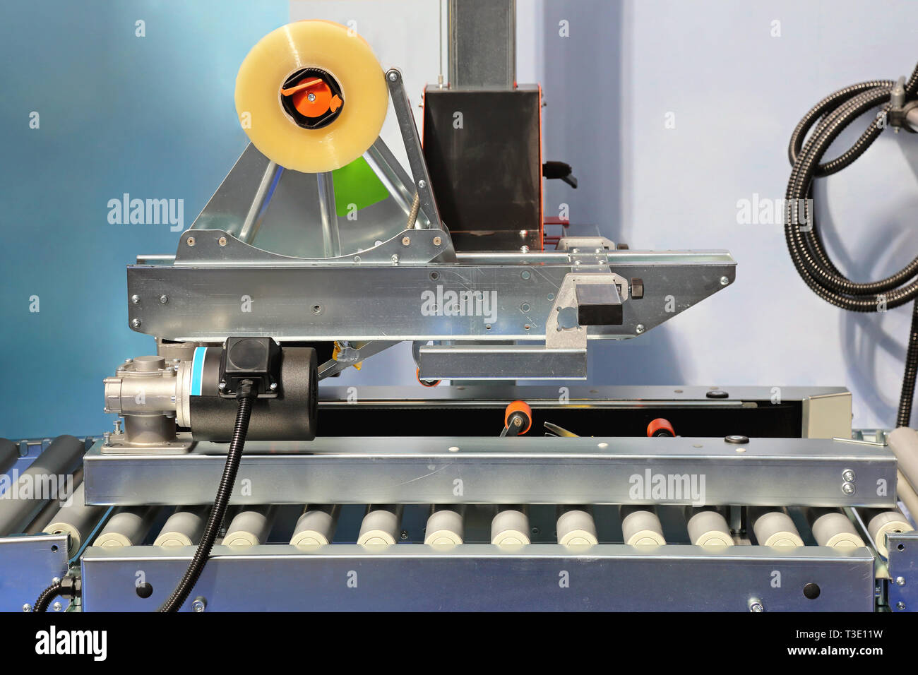 Automated Conveyor Packing Machine for Boxes in Factory Stock Photo - Alamy