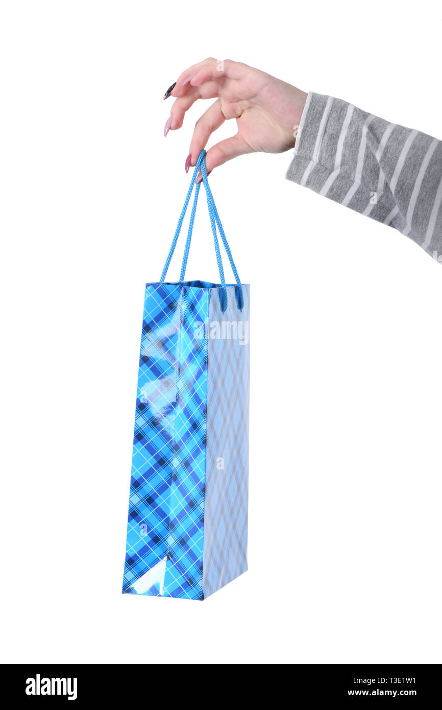 Package in female hand on white background isolation gift Stock Photo ...