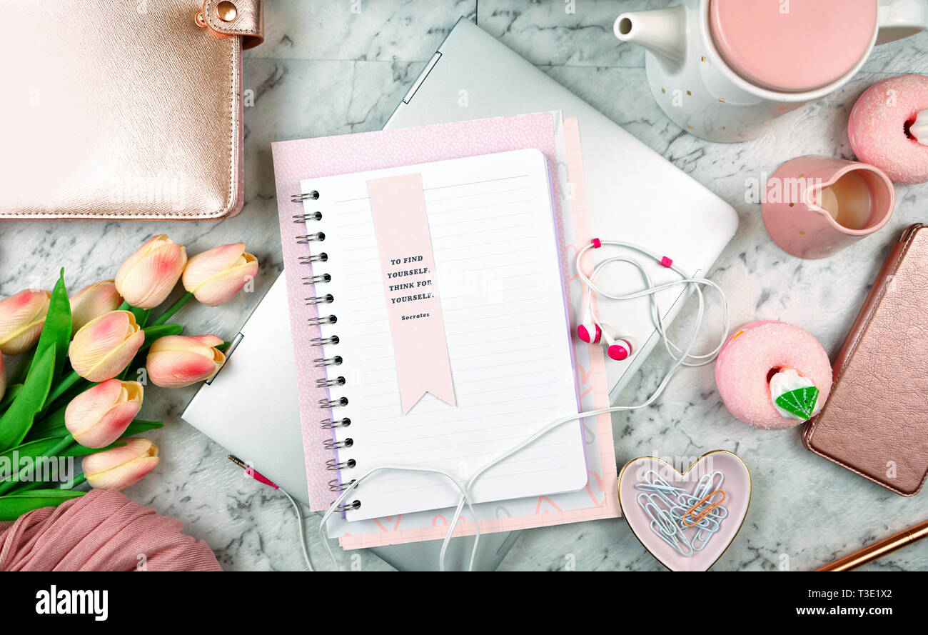 Feminine desk workspace with modern touch screen laptop and pink and ...