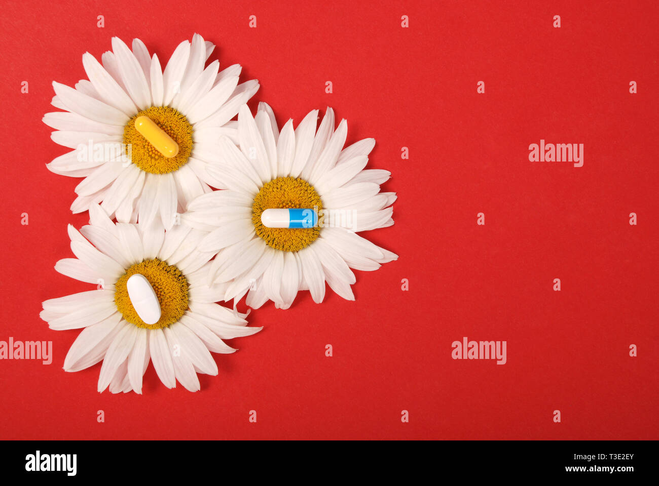 Vitamin capsule flower yellow hi-res stock photography and images - Alamy