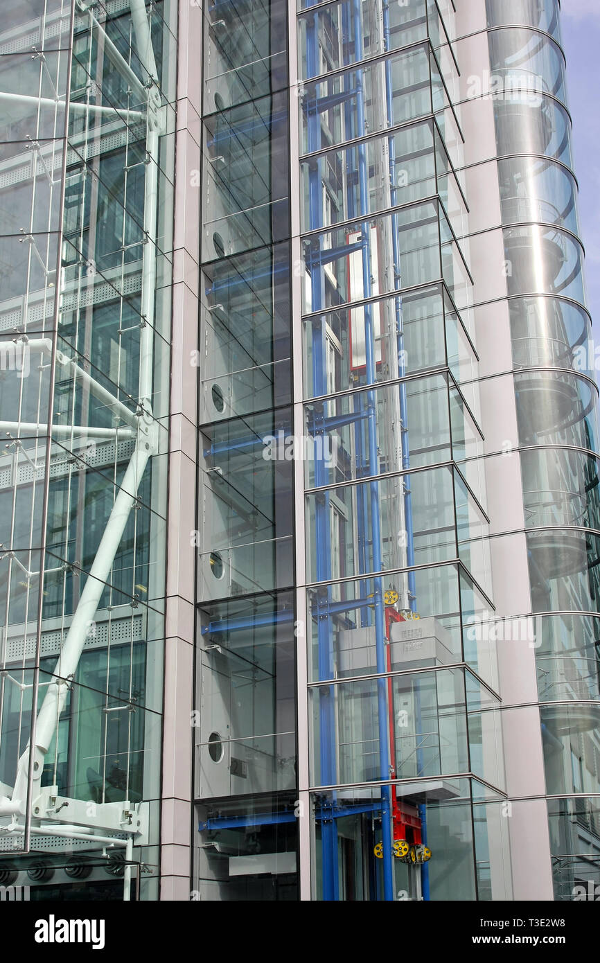 Glass lift shaft in modern bussiness building Stock Photo - Alamy