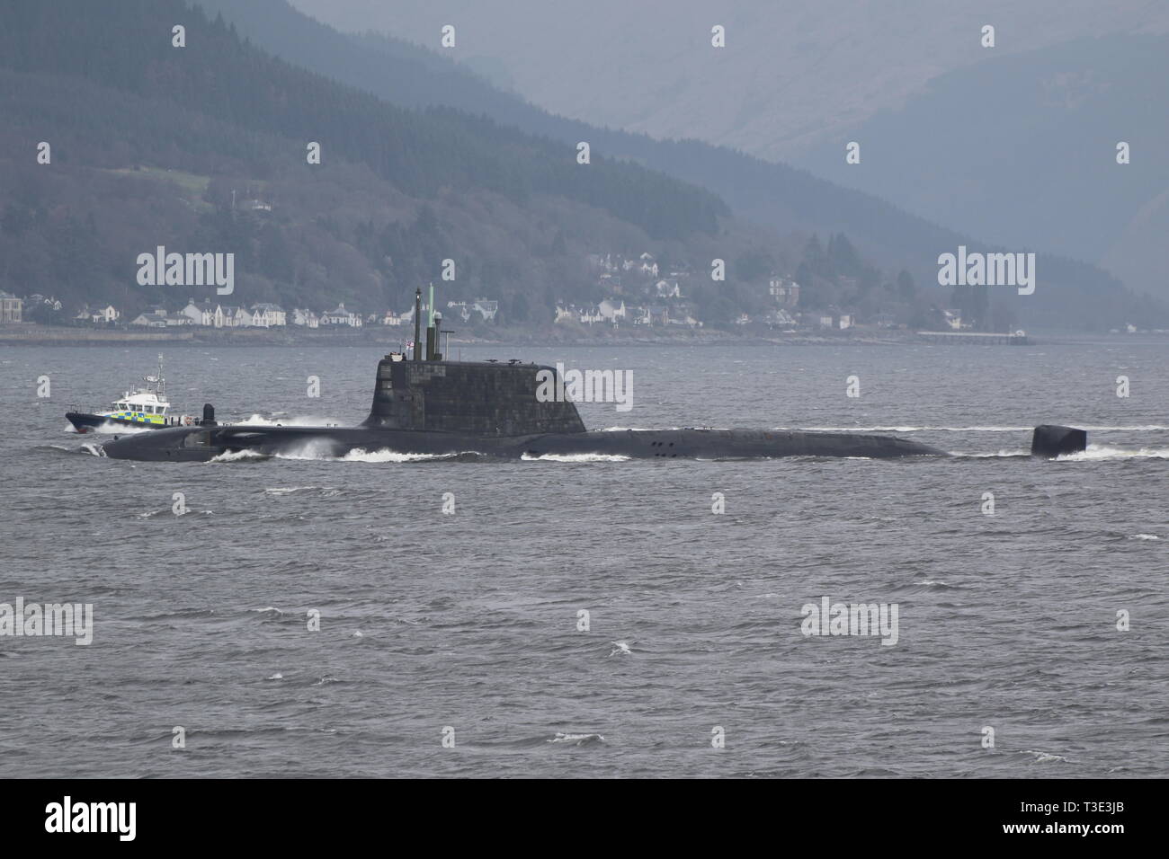 The Royal Navy's attack submarine HMS Ambush (S120), being escorted ...