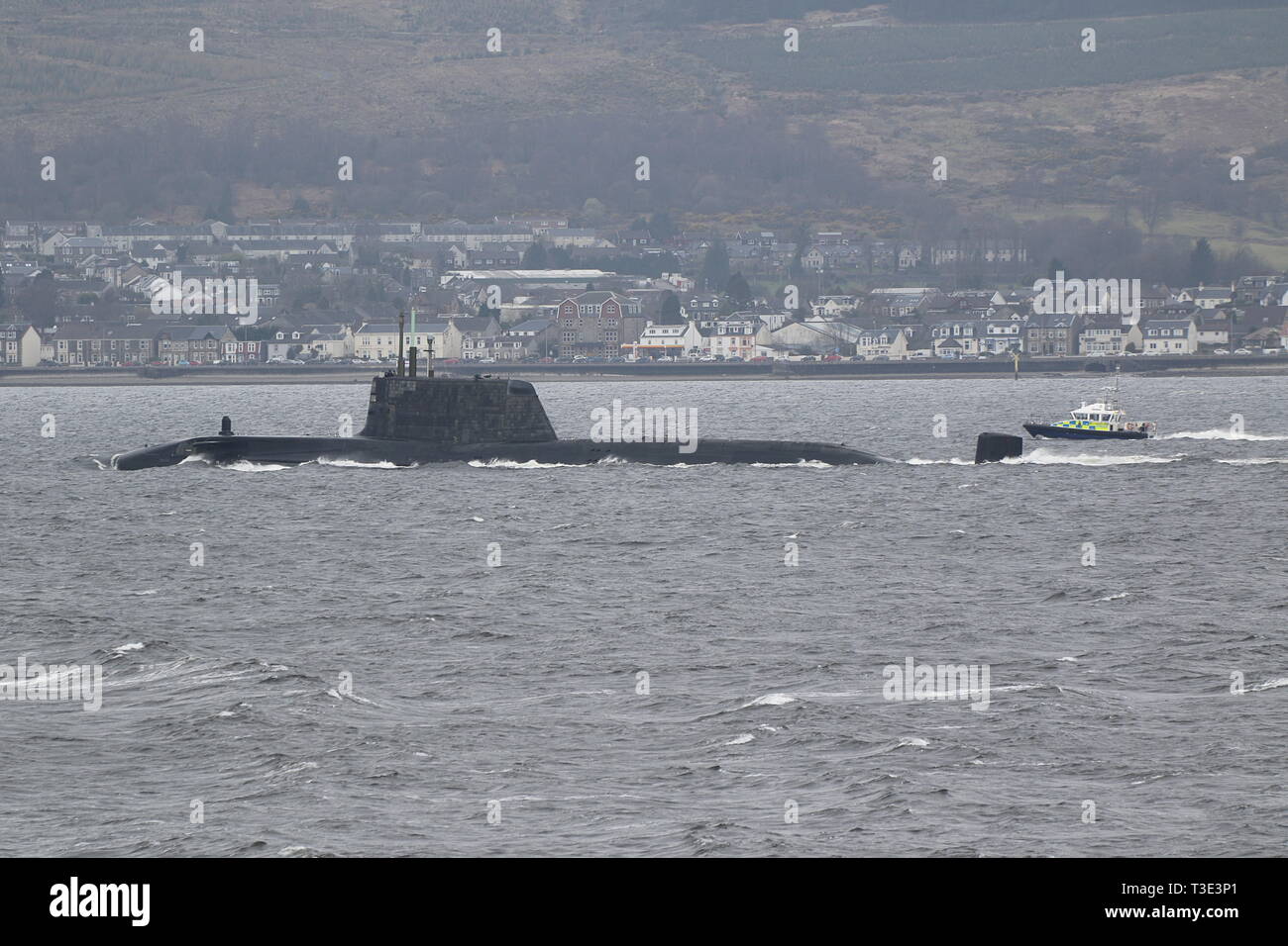 The Royal Navy's attack submarine HMS Ambush (S120), being escorted ...