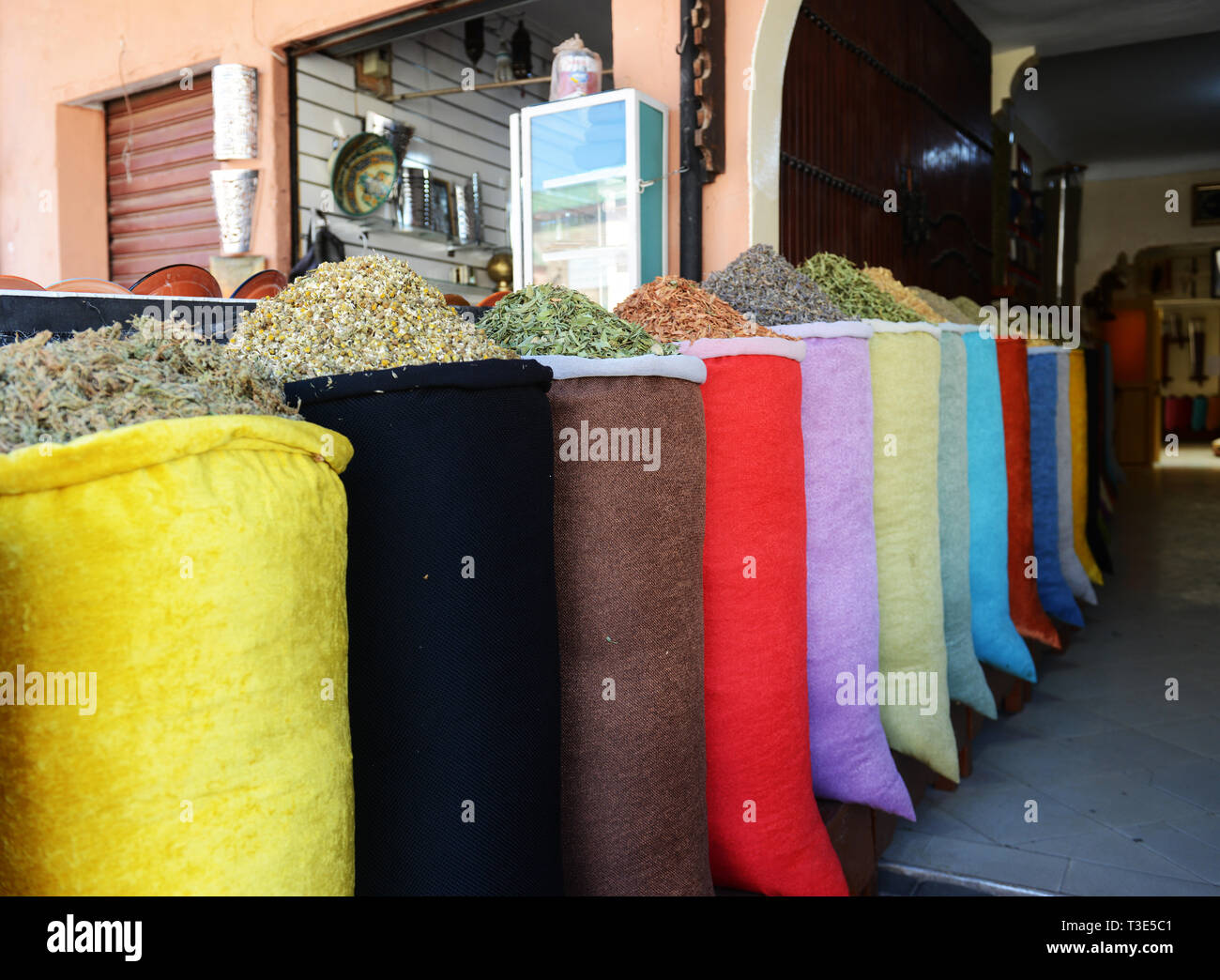 Colorful sacks of herbs and spices in the colorful market in Marrakesh ...