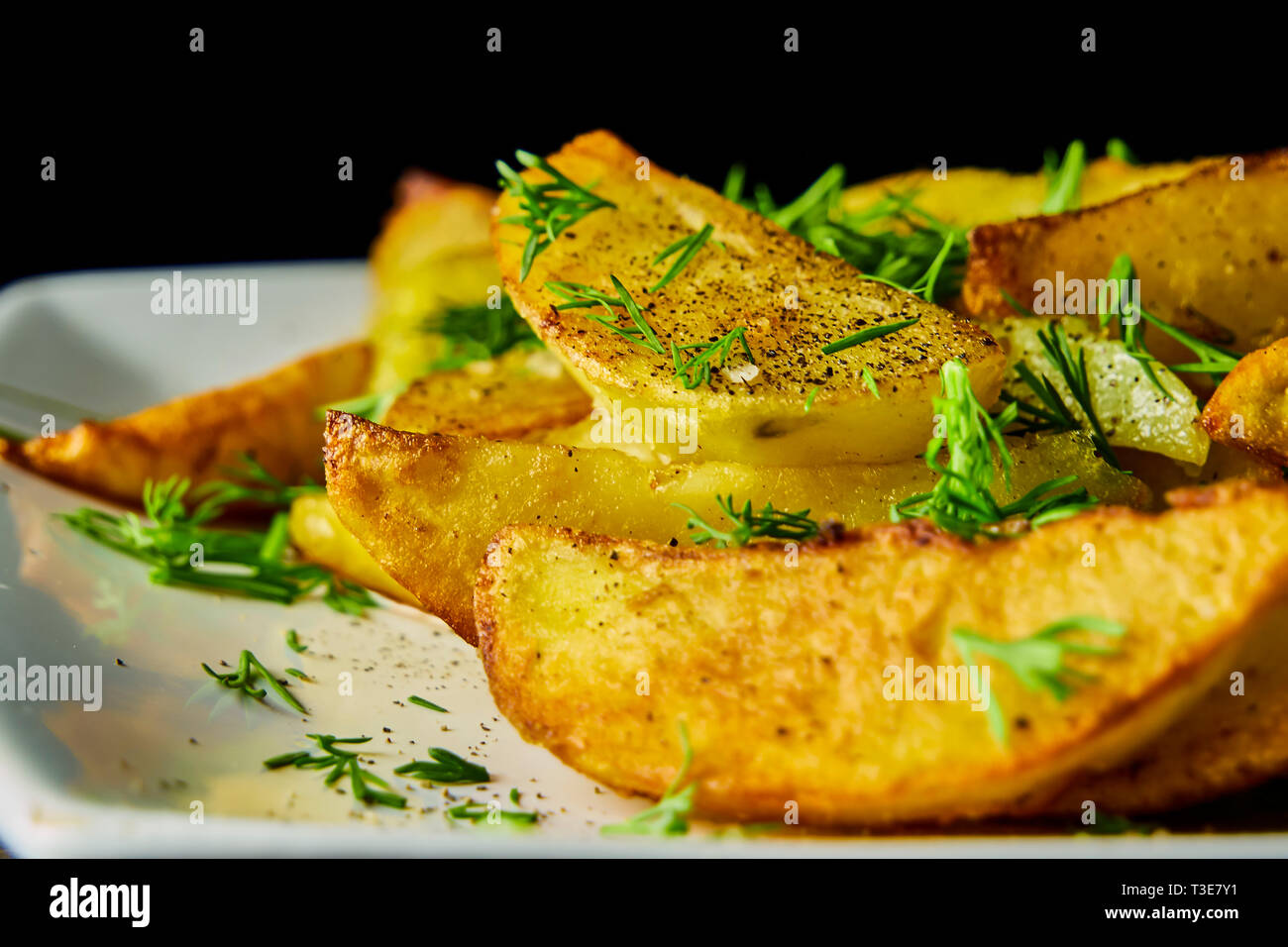 pleasant to the taste home-made fried potatoes with aromatic spices ...