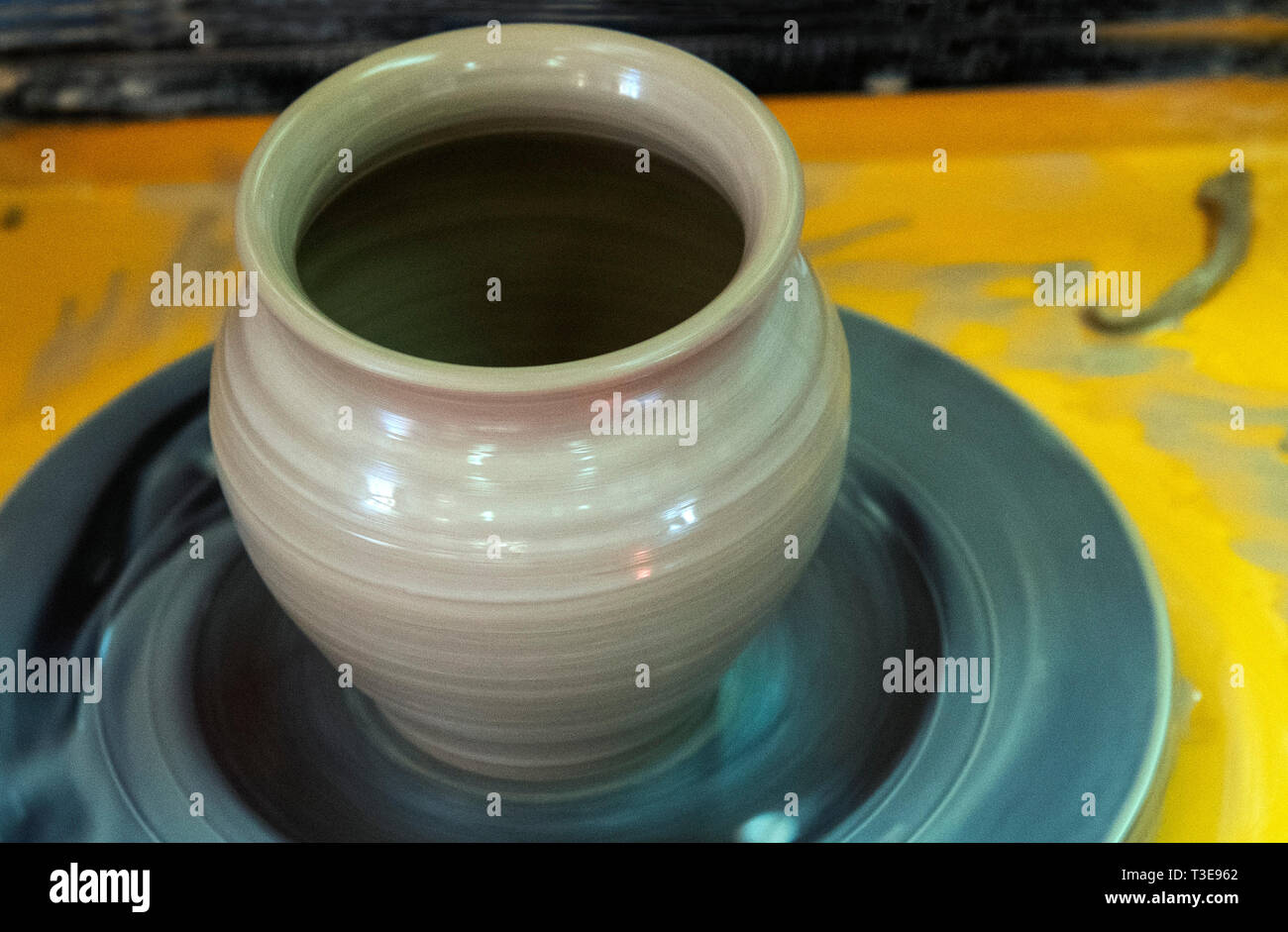 Master class on making a ceramic pot with a Potter's wheel. The pottery ...