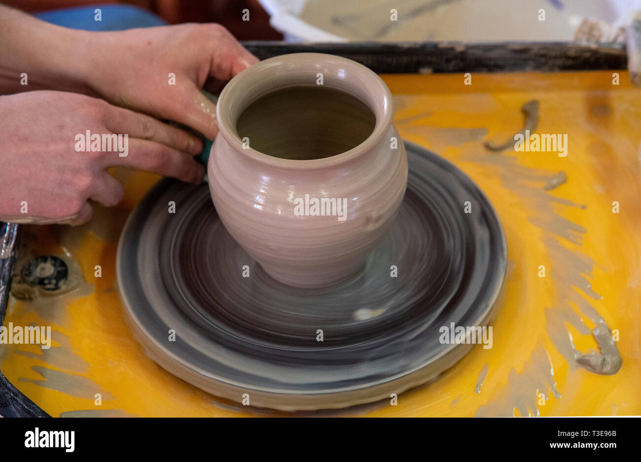 Master class on making a ceramic pot with a Potter's wheel. The pottery ...