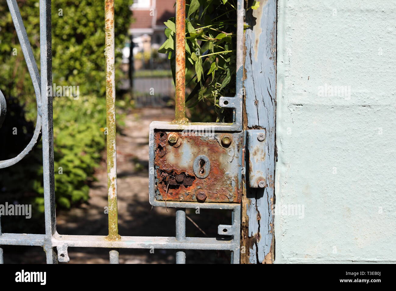 Wrought iron gate lock hi-res stock photography and images - Alamy