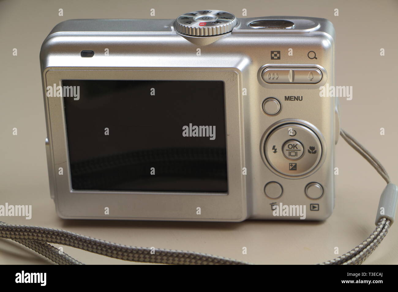 Back of a grey compact digital camera with screen Stock Photo - Alamy