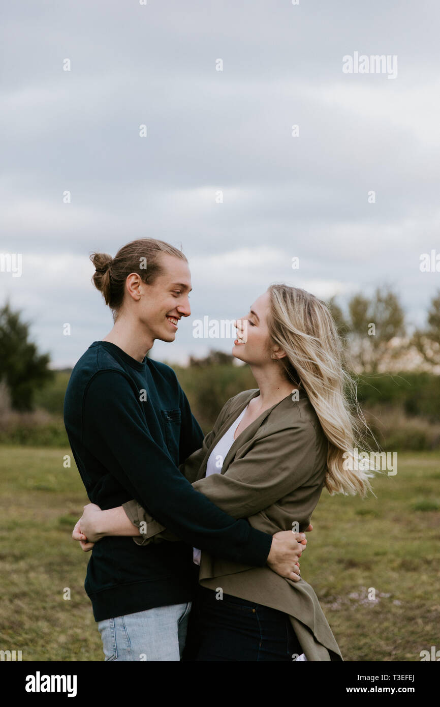 Man woman running young laughing hi-res stock photography and images ...