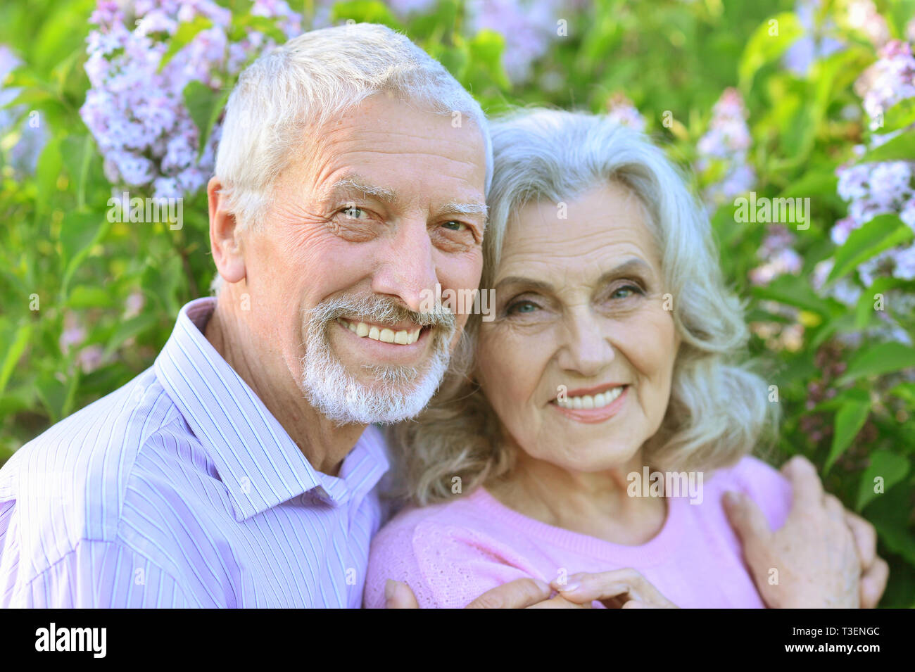 Happy couple posing hi-res stock photography and images - Alamy