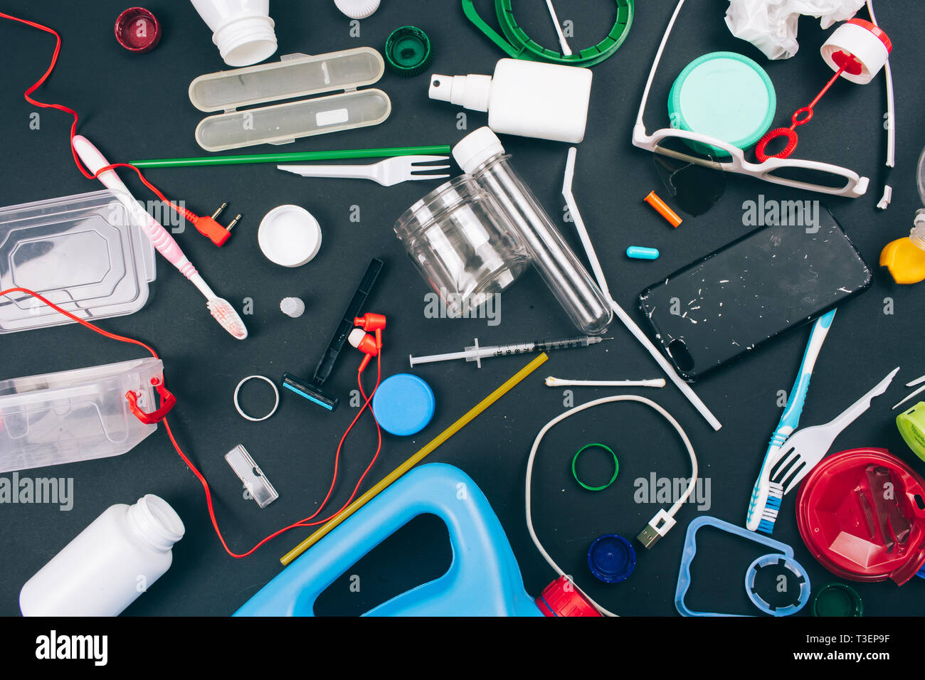 Refuse single-use plastic. Pollution concept. Orange, green, blue ...