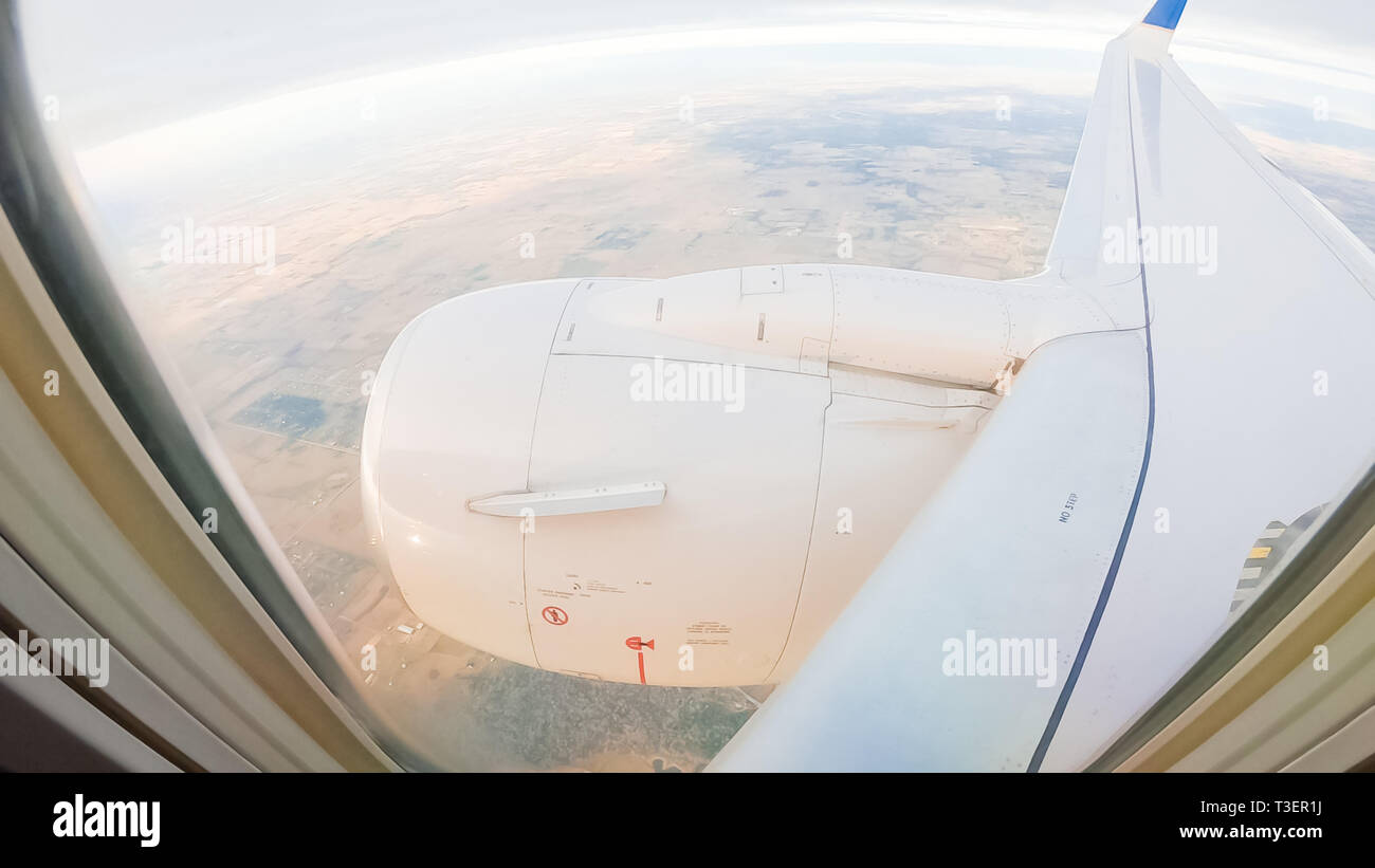View from the window seat of commercial passenger airplane Stock Photo ...