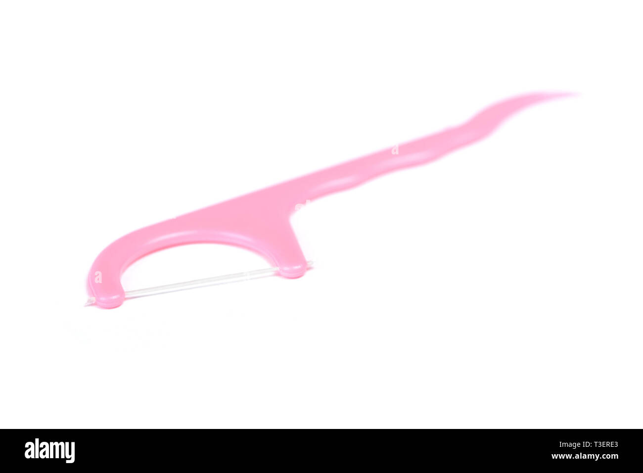 Pink floss toothpick isolated on white background Stock Photo - Alamy