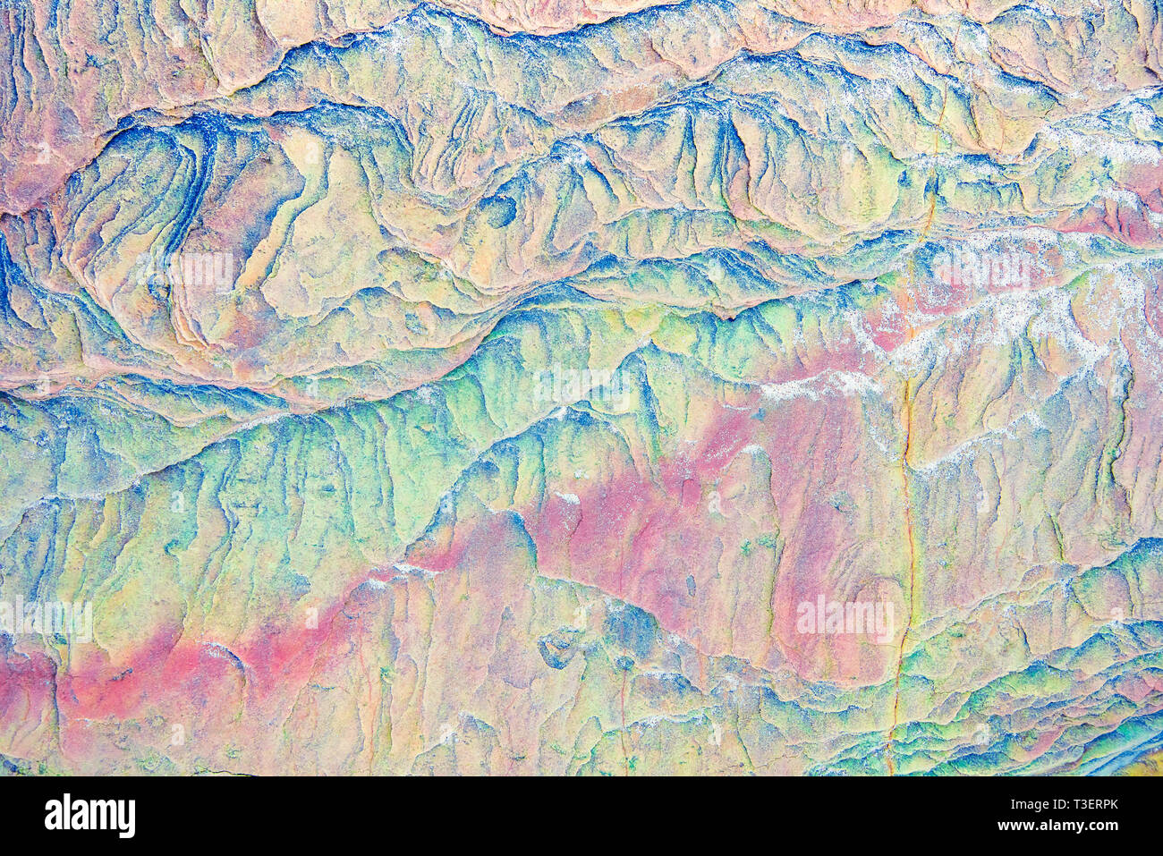 Colourful mosaics or rocks - layered sedimentary minerals exposed by ...
