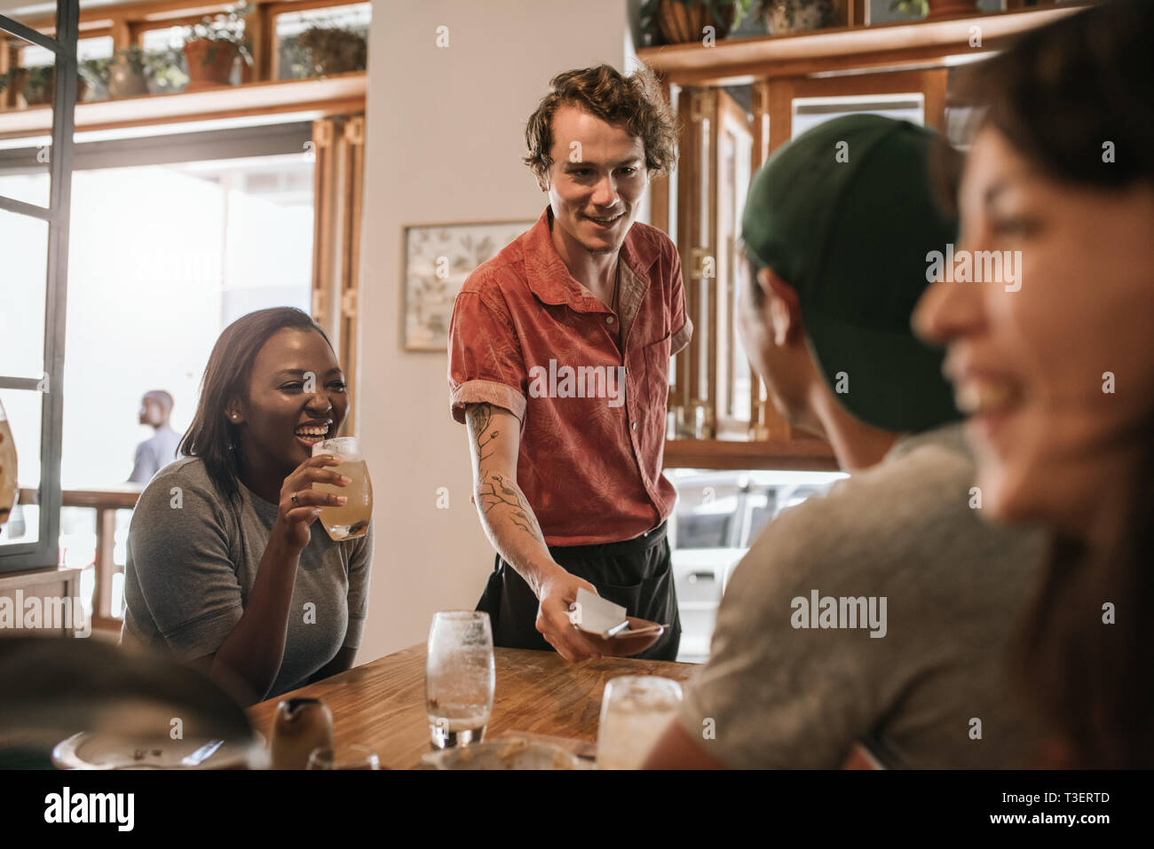 Handing a check hi-res stock photography and images - Alamy