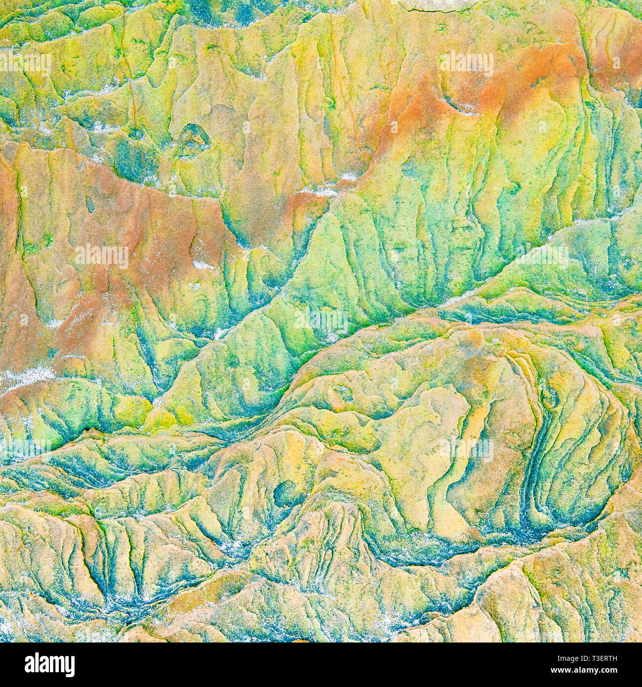 Colourful mosaics or rocks - layered sedimentary minerals exposed by ...