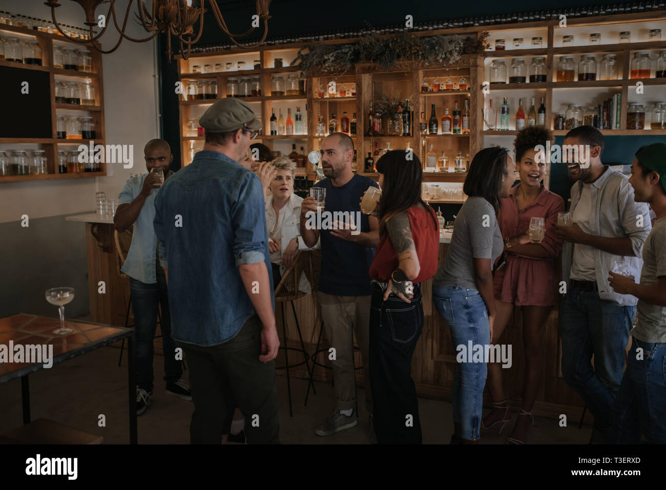 People men standing at bar drinking hi-res stock photography and images ...