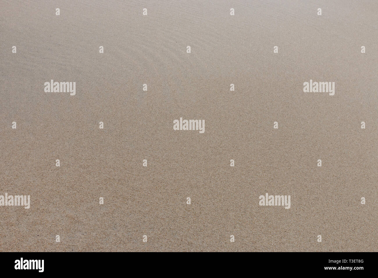 Natural wet and plain sand texture background Stock Photo - Alamy