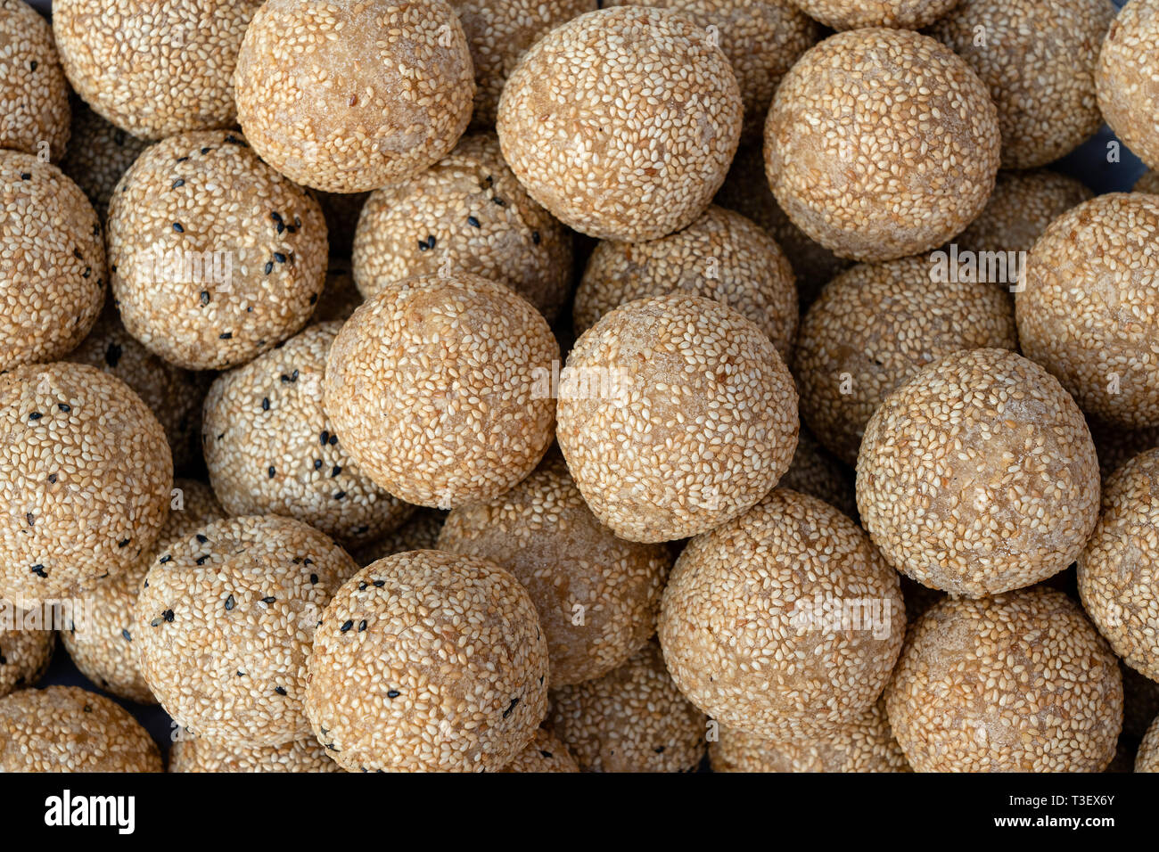 Coconut rice balls with sesame seeds is traditional Thai dessert made ...