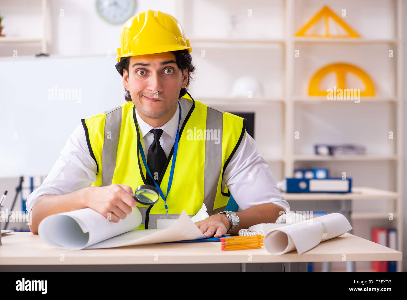 Male construction engineer working in the office Stock Photo - Alamy