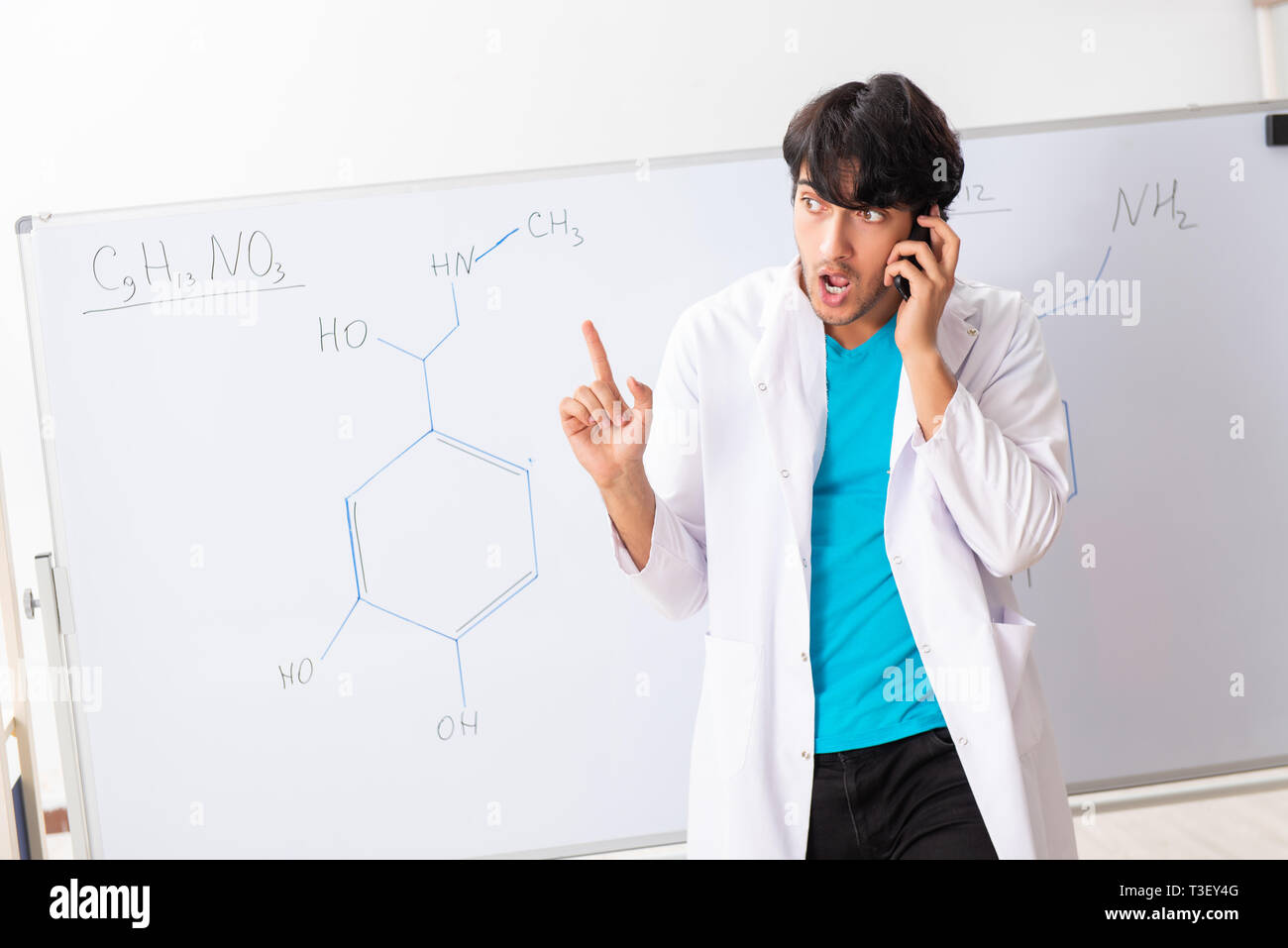 Teacher student talking in laboratory hi-res stock photography and ...