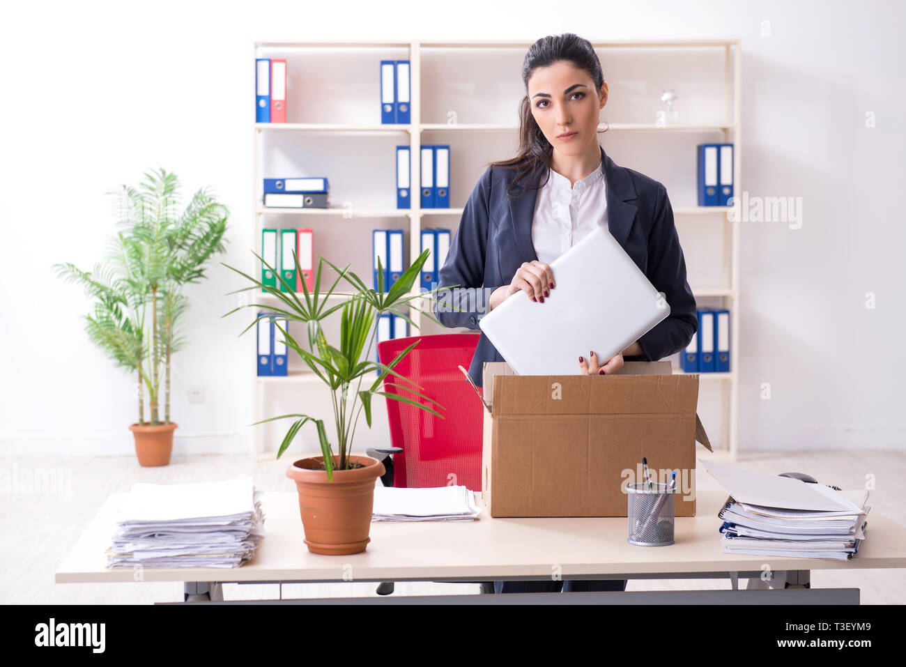 Young female employee being fired from her work Stock Photo - Alamy