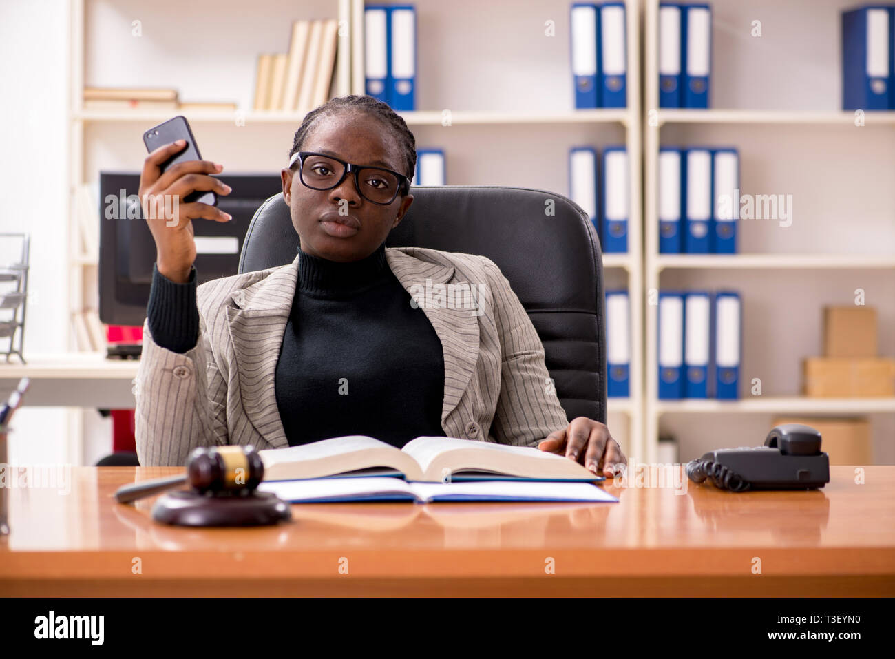 Black female lawyer in courthouse Stock Photo - Alamy