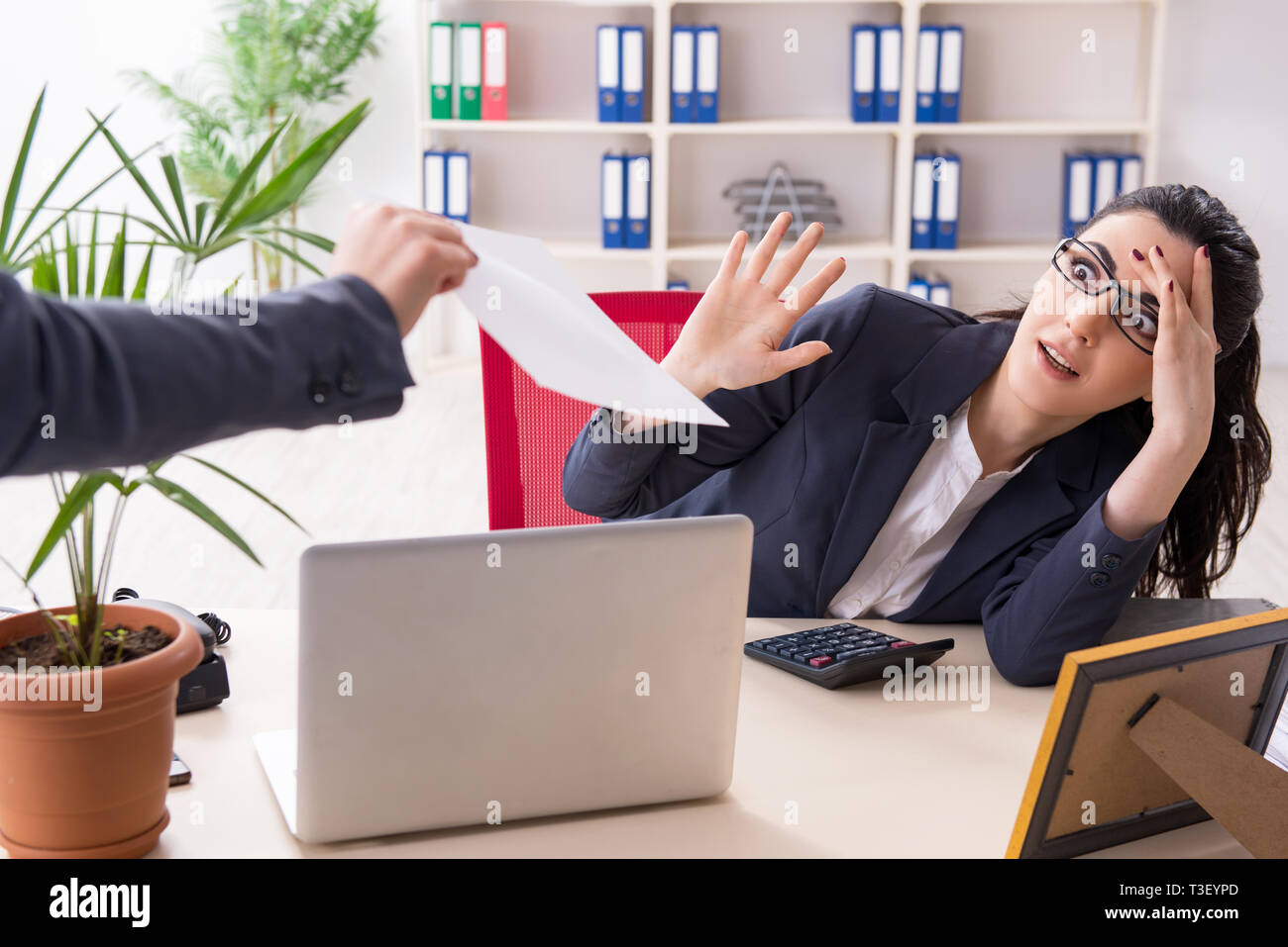 Young female employee being fired from her work Stock Photo - Alamy