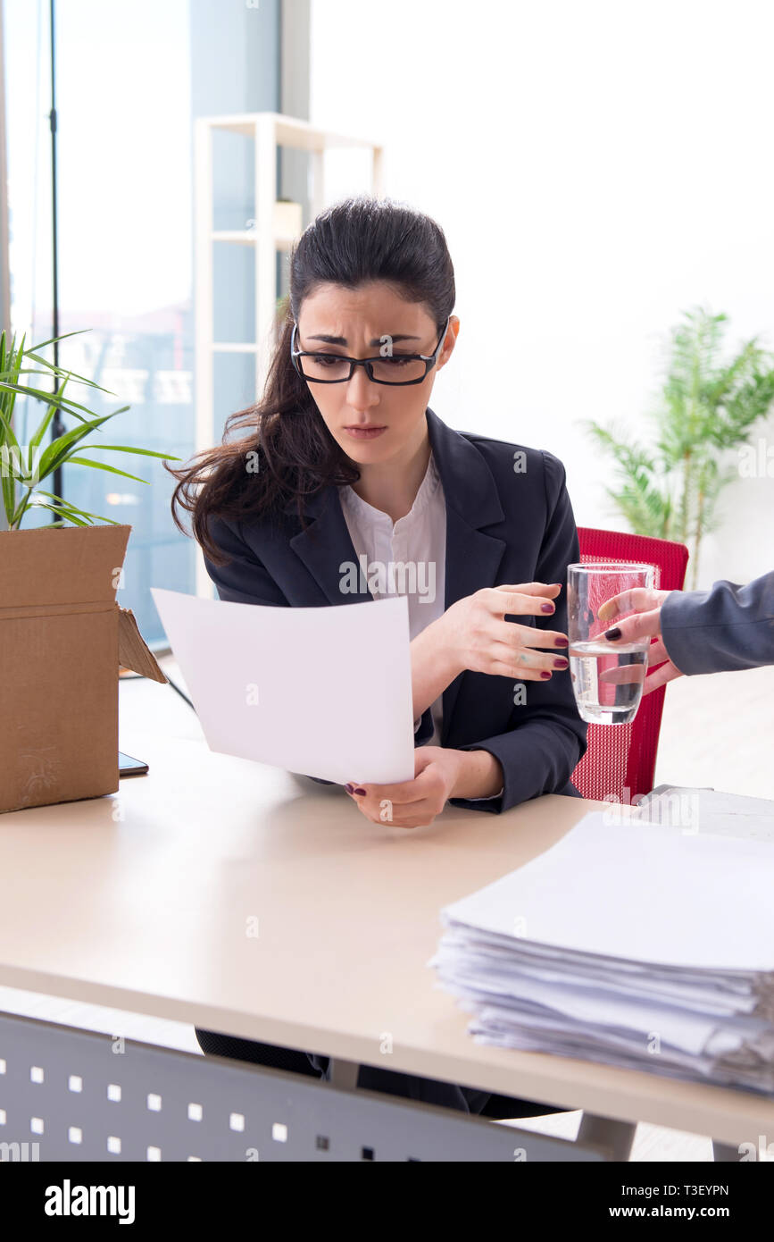 Young female employee being fired from her work Stock Photo - Alamy