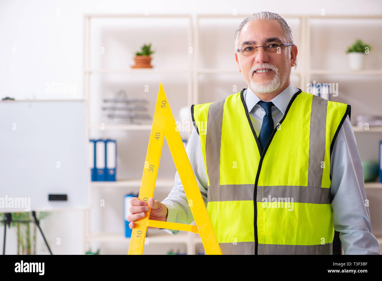 Senior engineer drawing standing hi-res stock photography and images ...