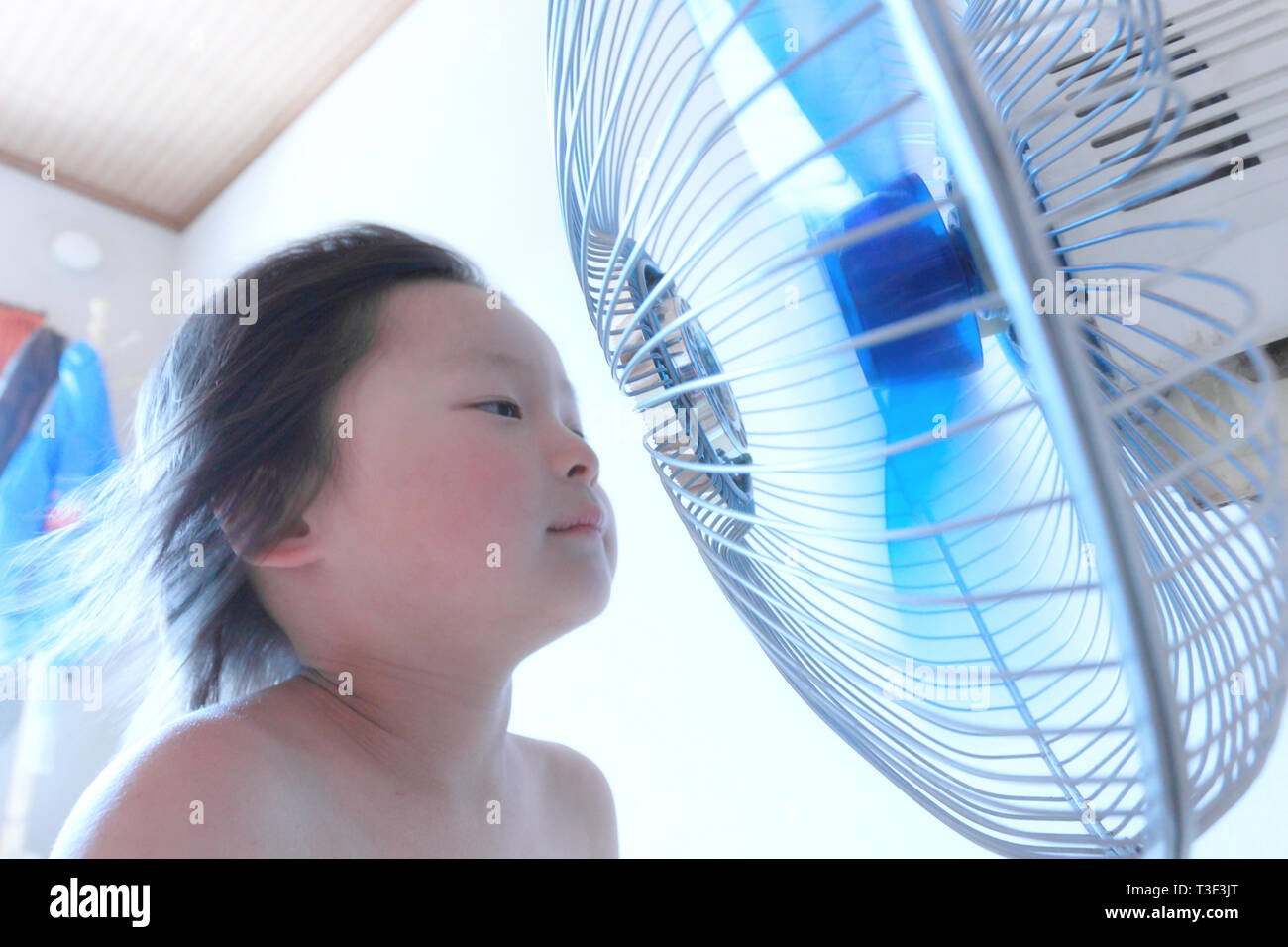Child fan hot hi-res stock photography and images - Alamy