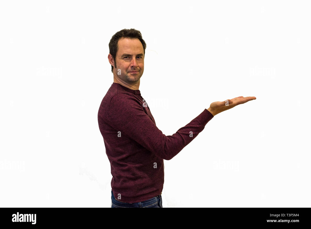 A handsome caucasian Man pointing on white background Stock Photo - Alamy