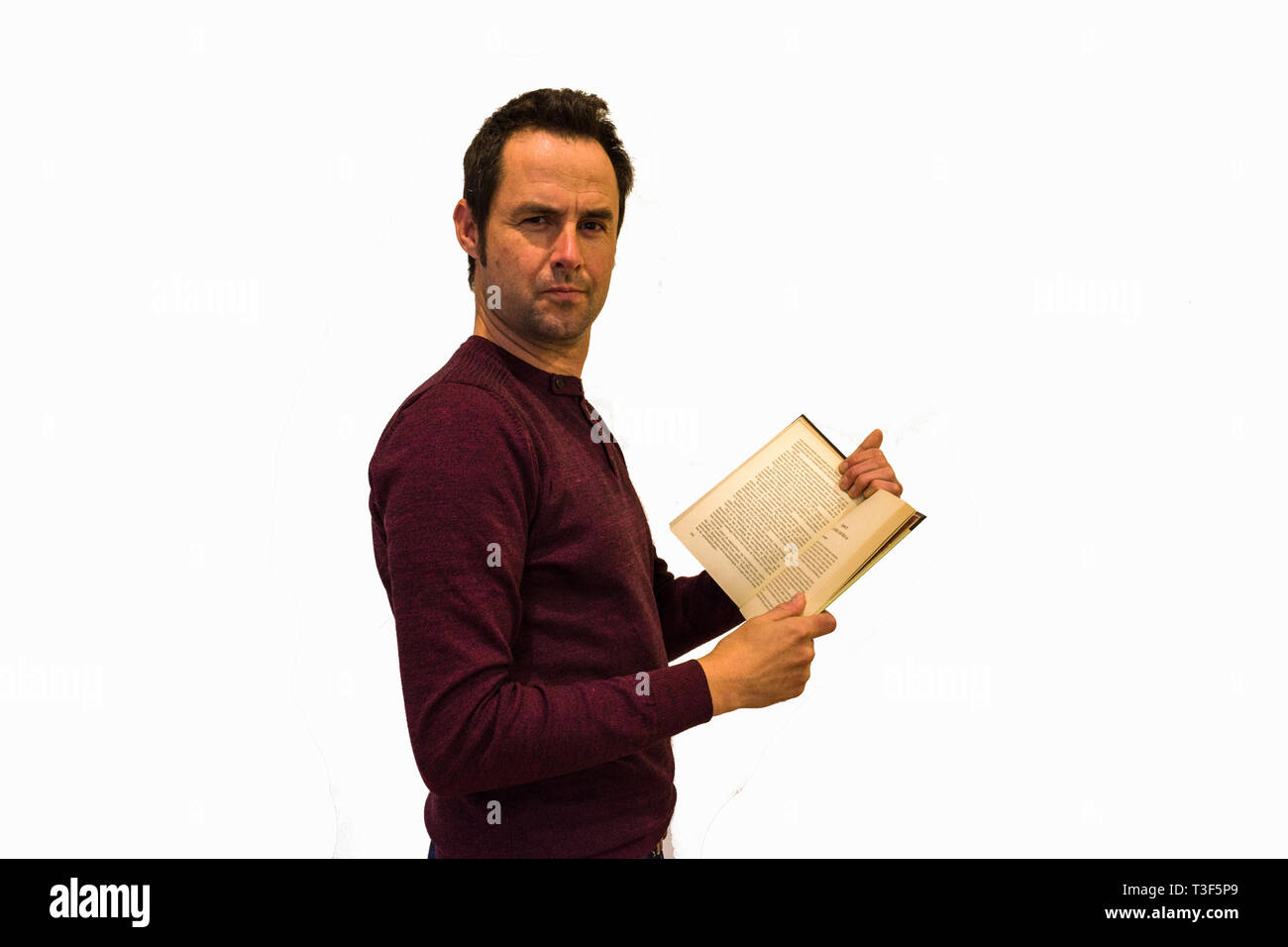 Man reading a book on white background Stock Photo - Alamy