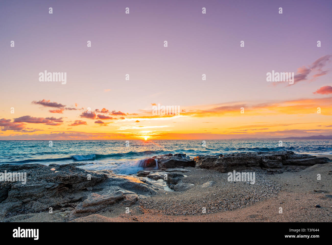 Sunset at the beach in Lefkas Greece Stock Photo - Alamy
