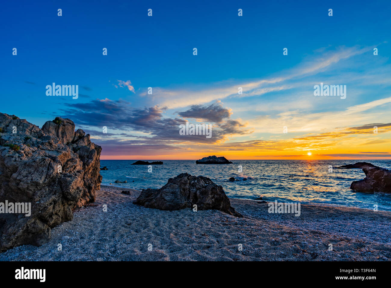 Sunset at the beach in Lefkas Greece Stock Photo - Alamy