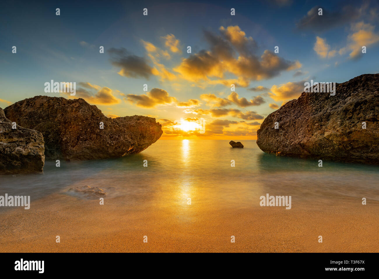 Sunset at the beach in Lefkas Greece Stock Photo - Alamy