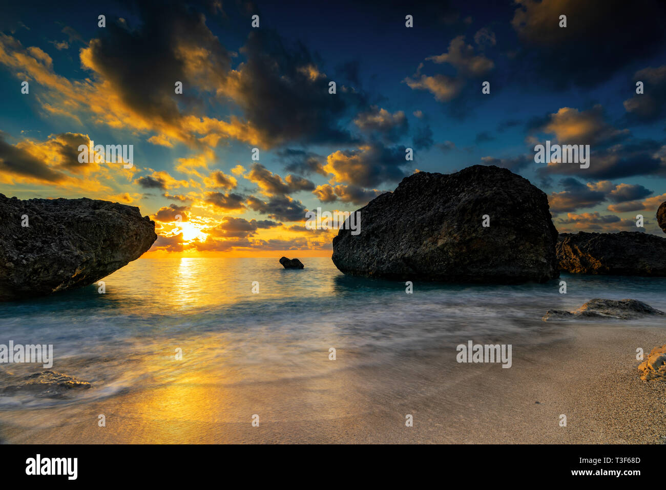 Sunset at the beach in Lefkas Greece Stock Photo - Alamy