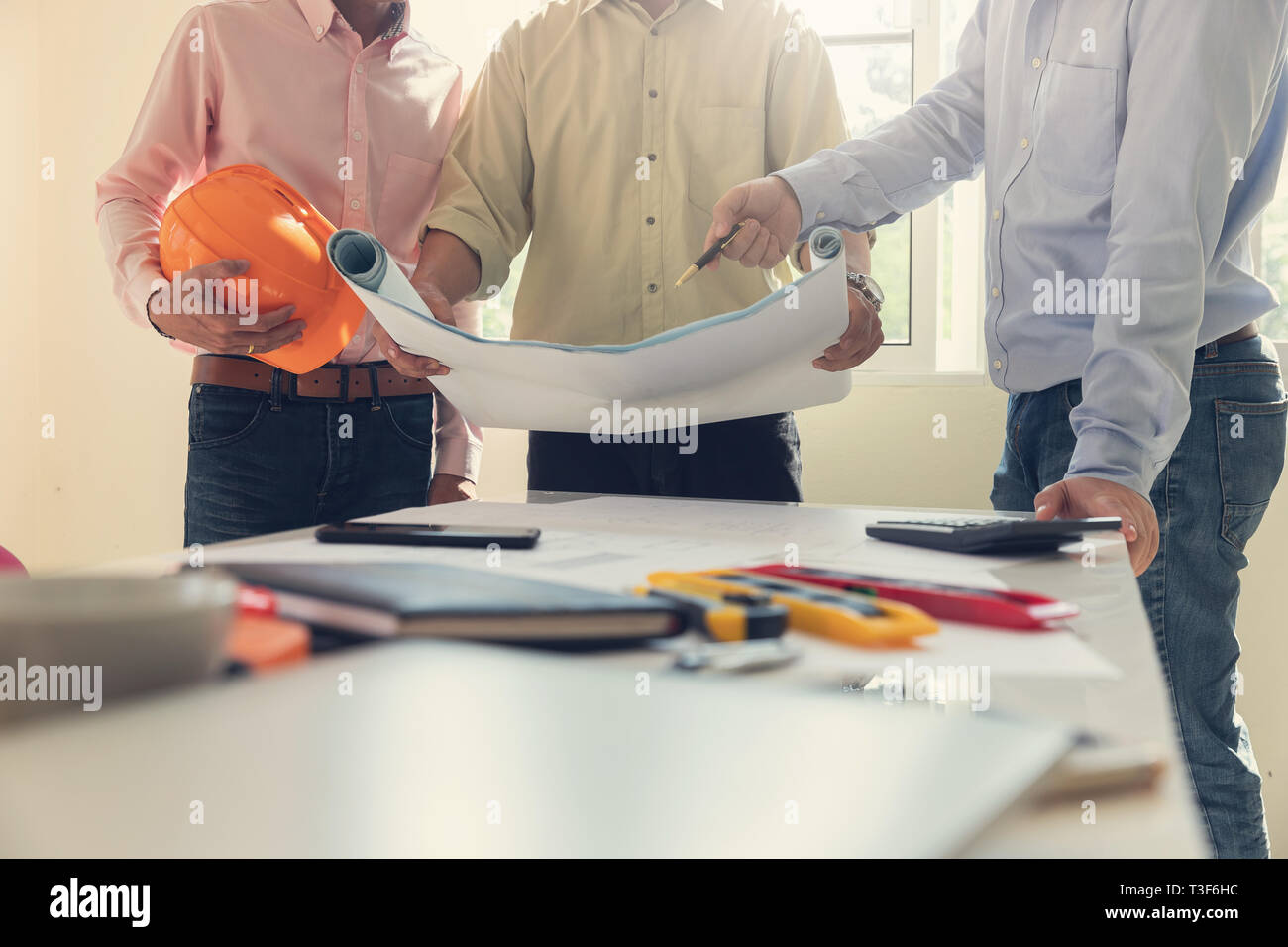 Engineer and Architect concept, Engineer Architects office team working ...