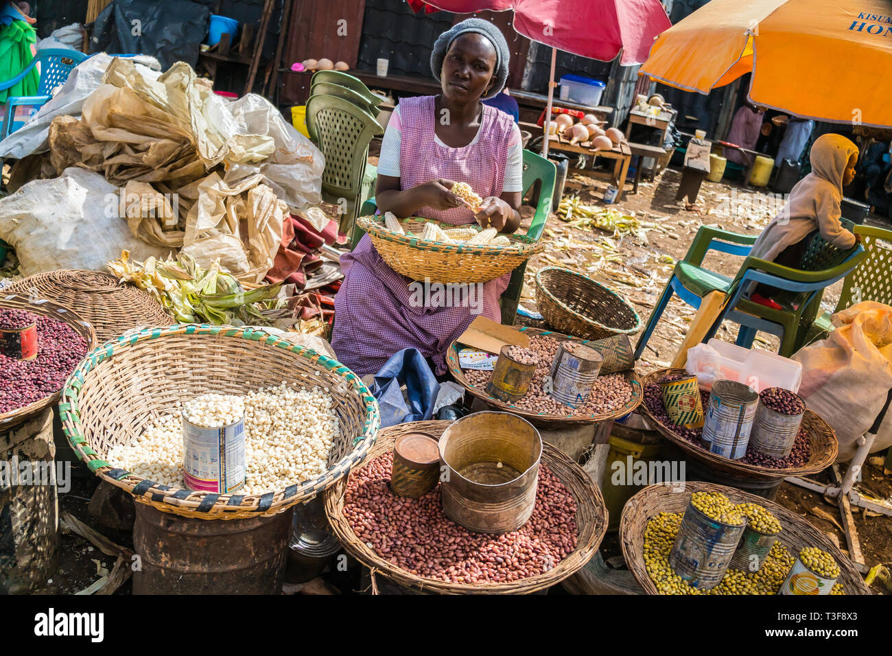 Kisumu, Kenya - March 8, 2019 - woman sells food at Kibuye market ...