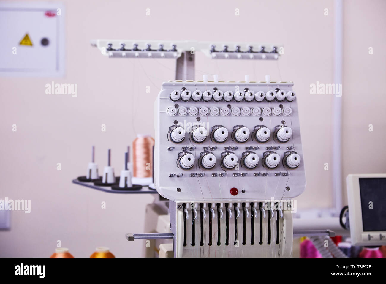 12 Needle Compact Embroidery Machine. Industrial Embroidery Stock Photo ...