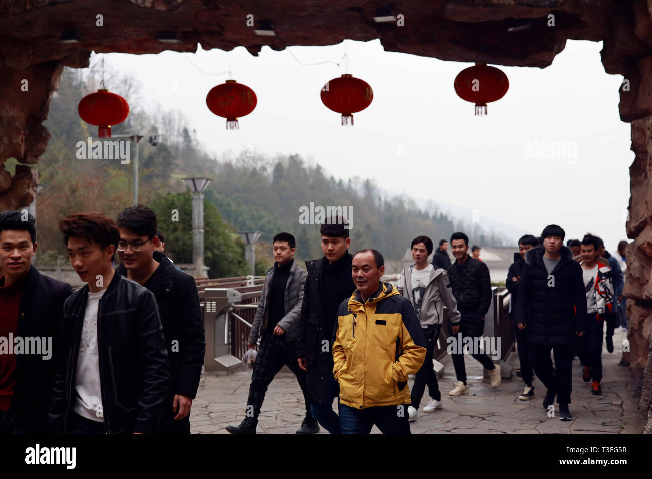 Chongqing, China. 09th Apr, 2019. Yang Xingyong (C) and his colleagues ...