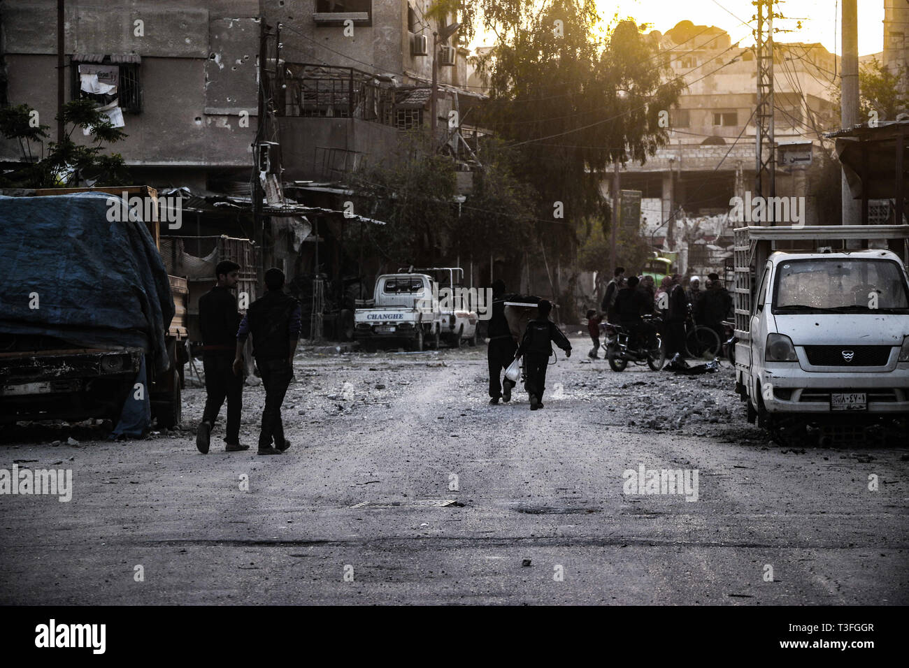 Douma, East of Damascus, Syria. 8th Apr, 2018. Civilians seen moving ...
