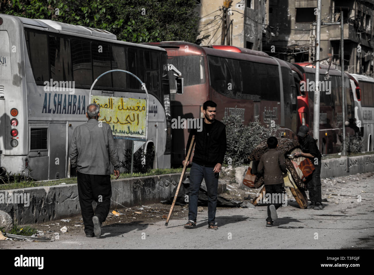 Douma, East of Damascus, Syria. 9th Apr, 2018. Civilians seen next to ...