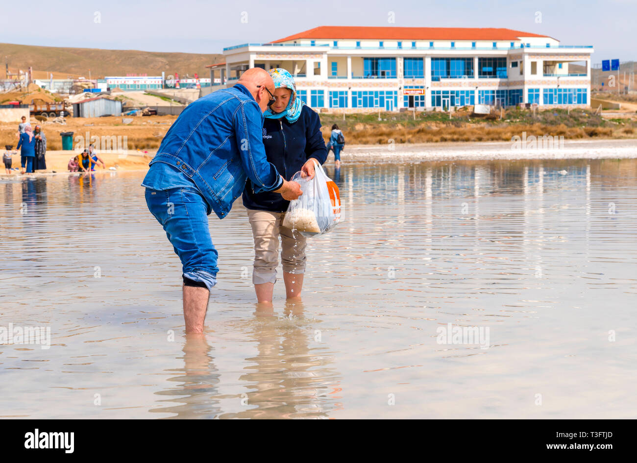 Ankara/Turkey- April 06 2019: Old Turkish couple pick salt crystal ...