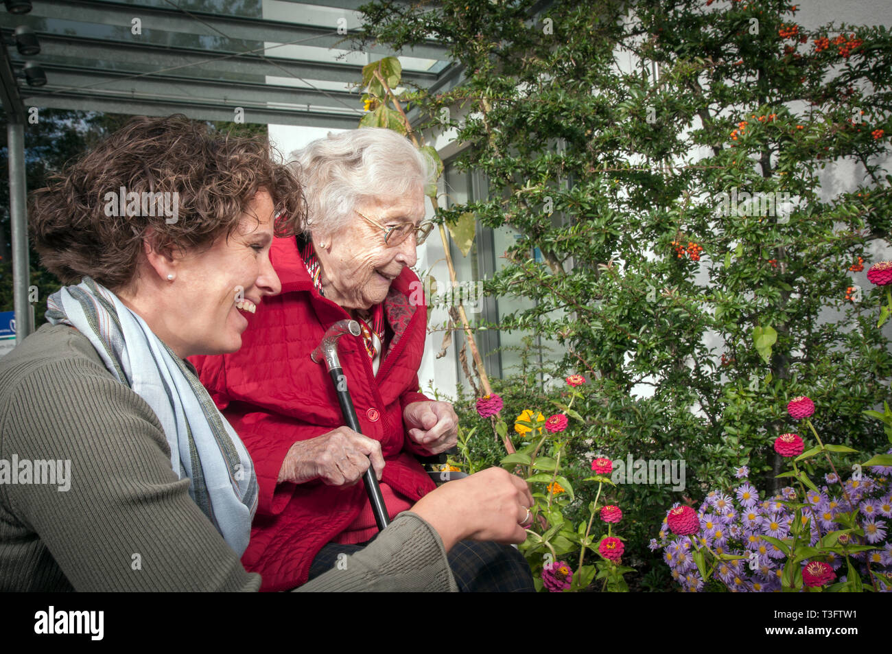 Caregiver walk old woman hi-res stock photography and images - Alamy
