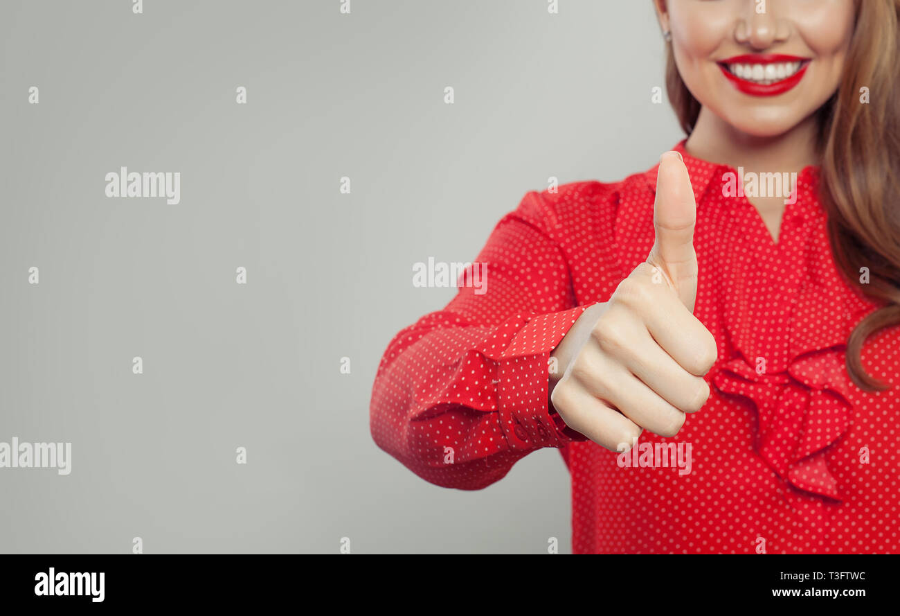 Thumb up. Female hand showing thumb up Stock Photo - Alamy